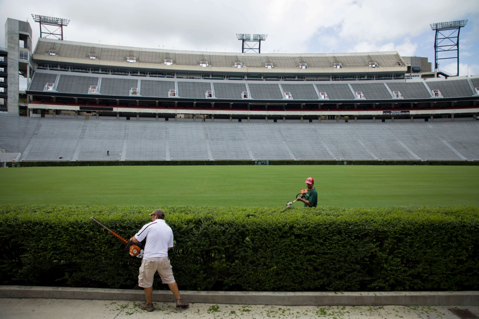 About, Behind and Between the Hedges - UGA Alumni